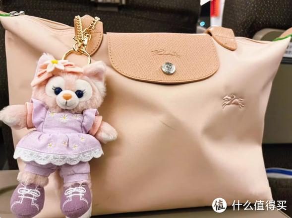 怎么把公仔挂在包上