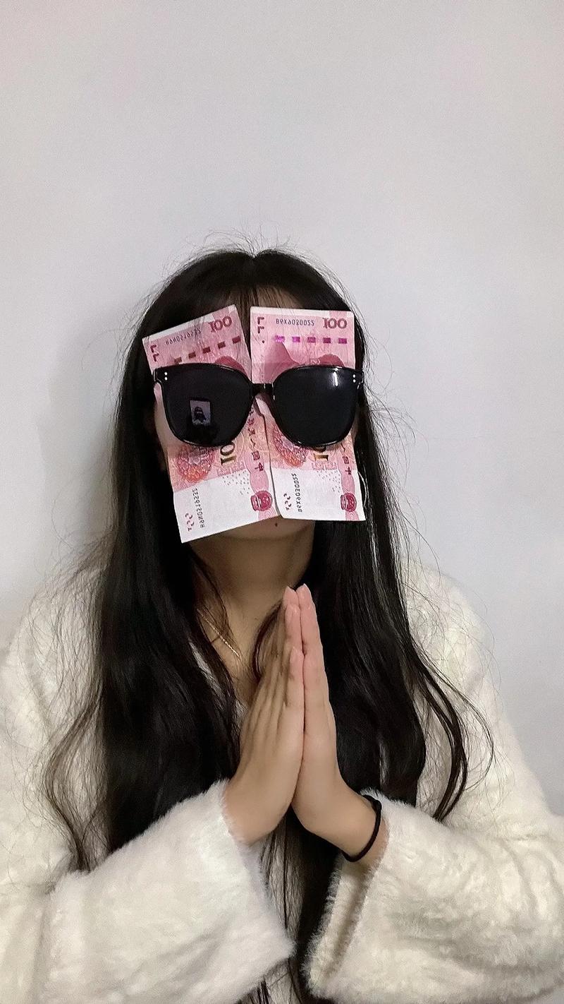 脸上贴100块钱图片图标