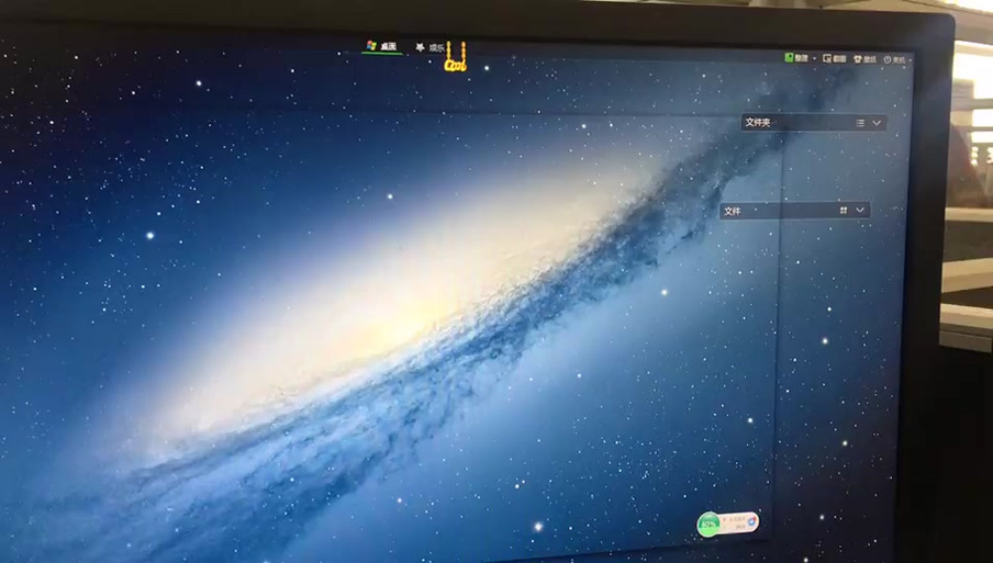 电脑屏幕中间出现一个黑框图标