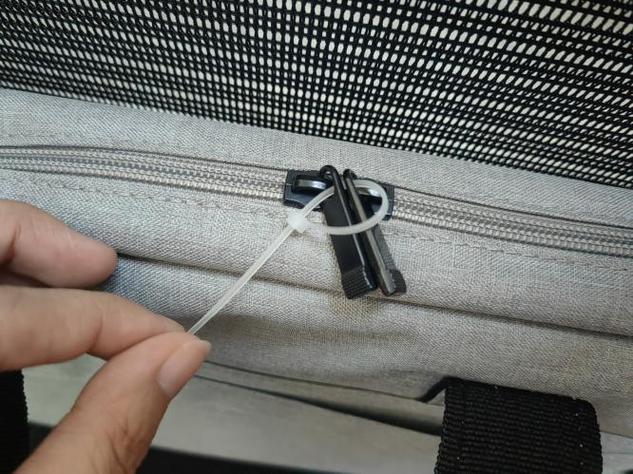 怎样防止衣服拉链下滑图标