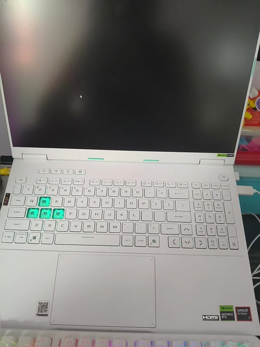 华硕黑屏了按什么键截图