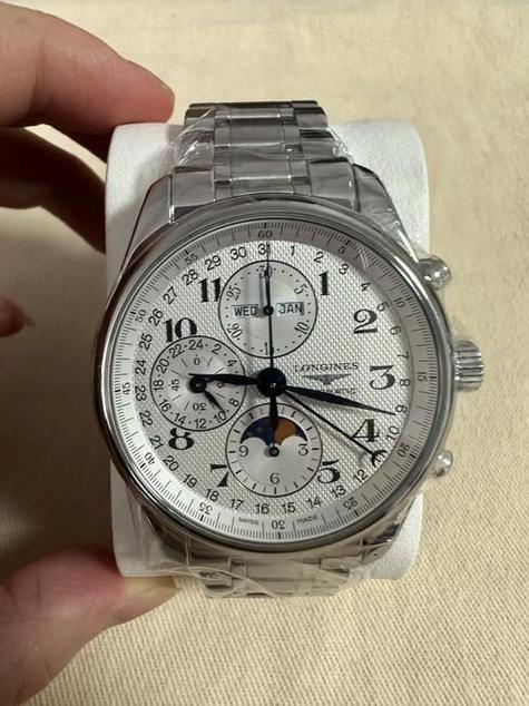 浪琴机械表日期慢一天怎么调图标