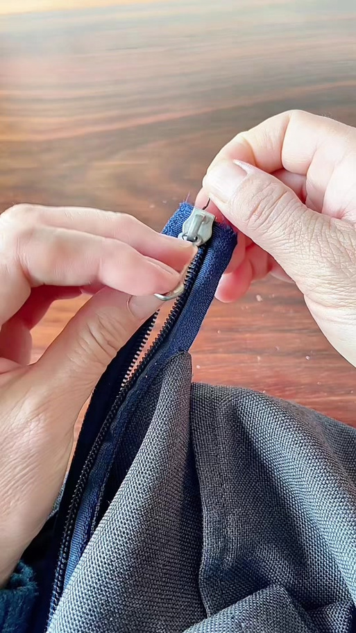 衣服口袋拉链头掉了怎么装回去截图