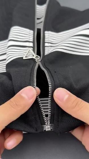 羽绒服拉链坏了可以换成扣子图标
