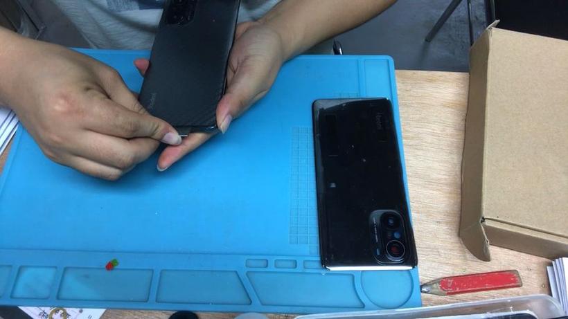 红米k40换后盖视频图标