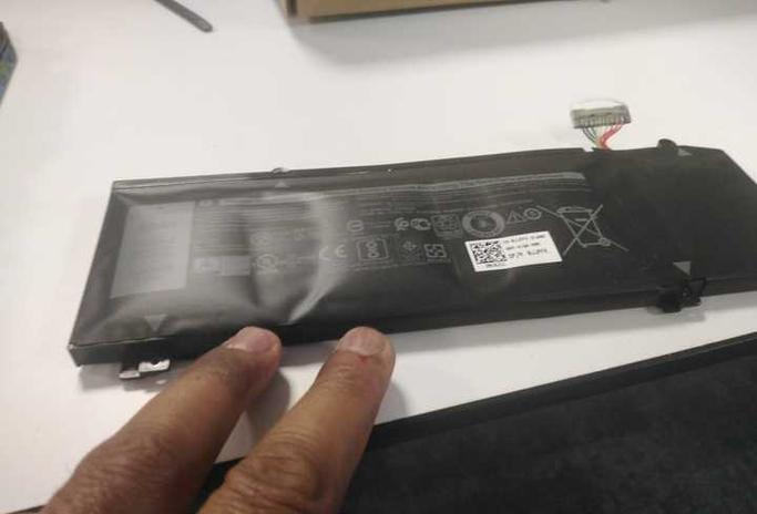 怎么区分电池鼓包和后盖开胶图标
