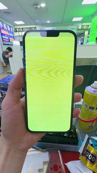 苹果手机屏幕右上角绿了一块图标