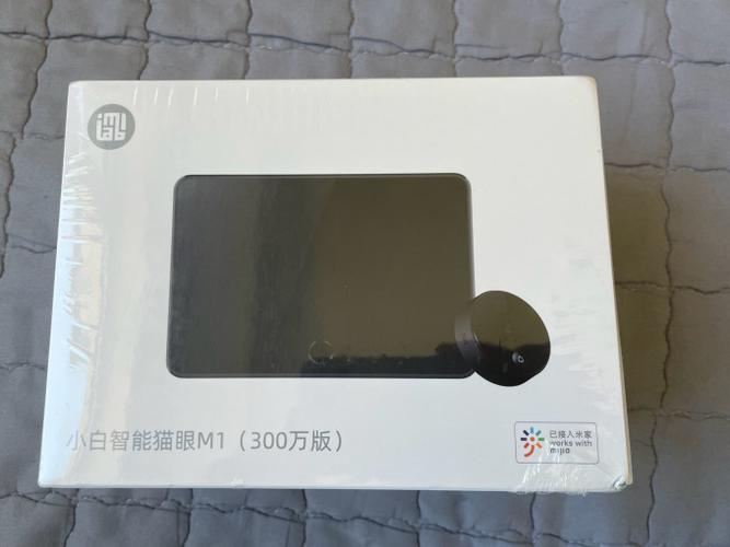 小白和米家智能猫眼对比图标