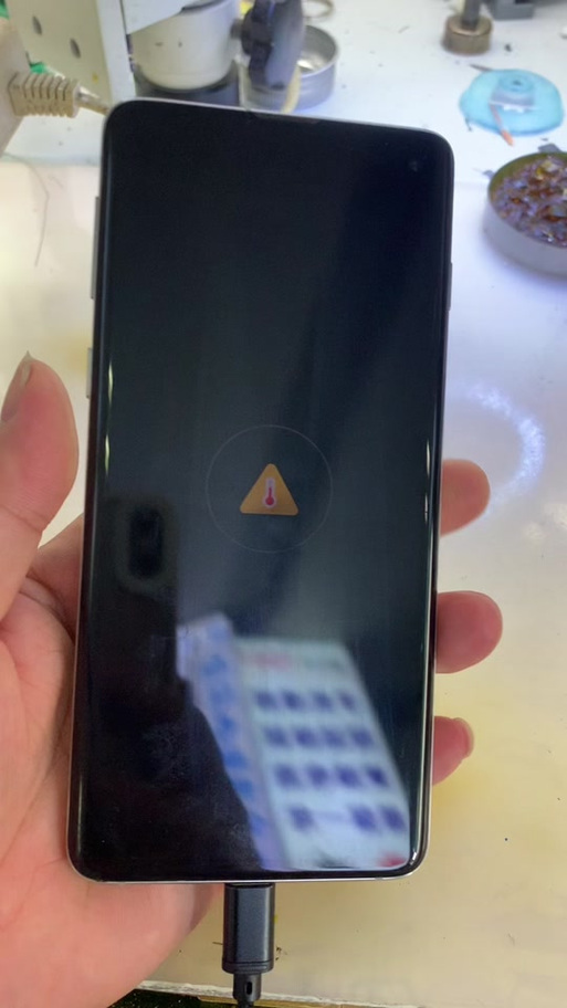 三星充电显示三角形感叹号振动截图