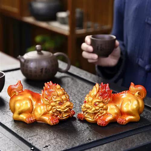 养貔貅的人图标