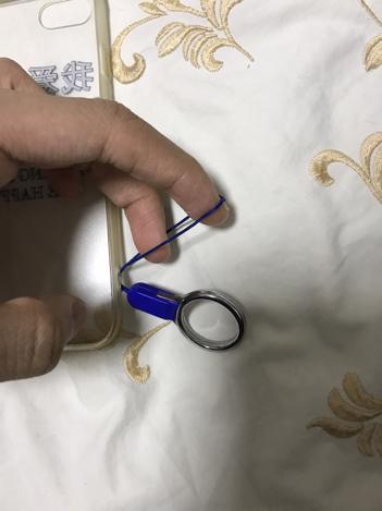 手机壳上面的挂绳怎么挂图标