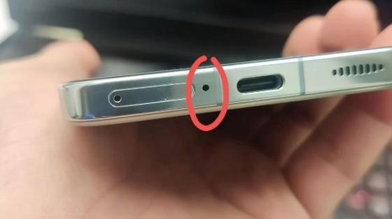 手机卡槽旁边的小孔不小心捅了一下图标