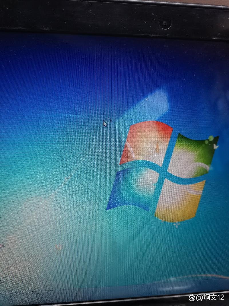 win7鼠标旁边的圈一直闪图标