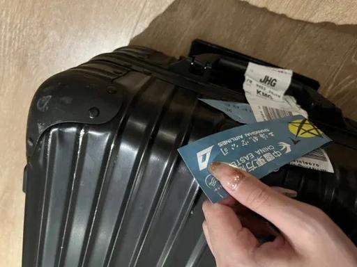 行李箱被撞瘪了一个角怎么办图标