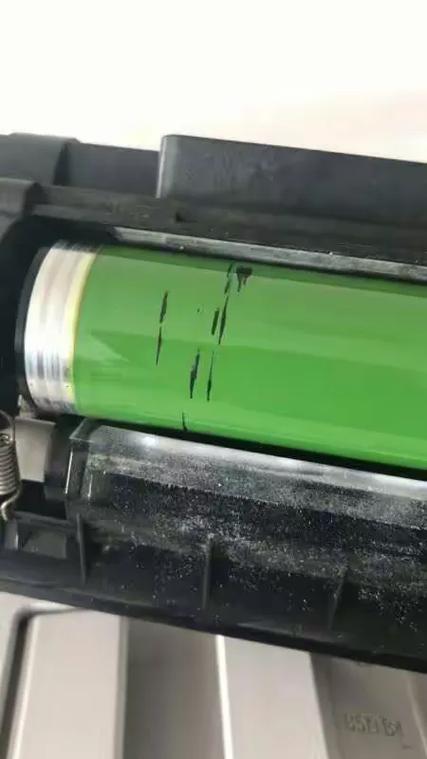 硒鼓绿色轴有碳粉图标