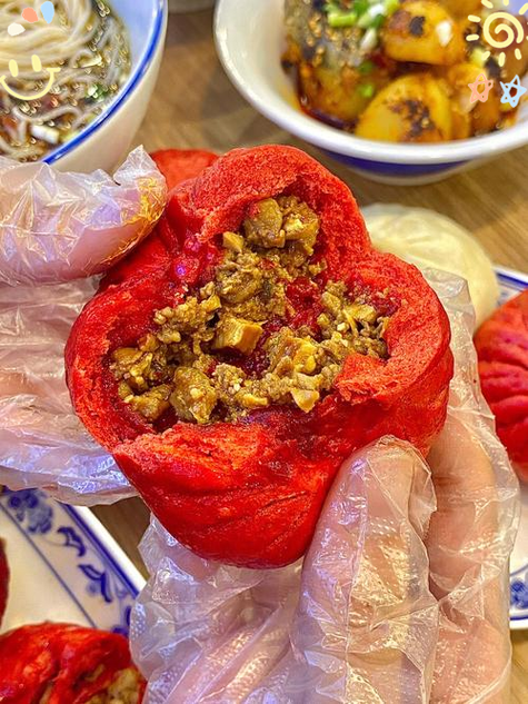 一个红色大包子表情图标