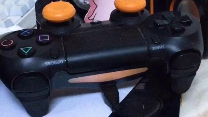 ps4手柄充电黄灯一闪一闪图标