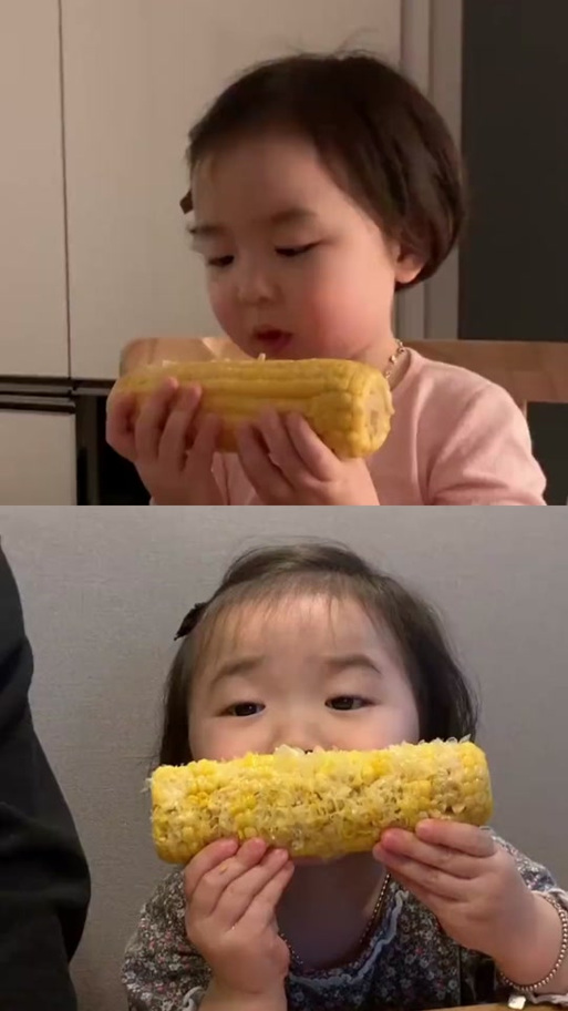 小女孩啃玉米表情包图标