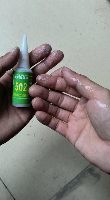 502胶水粘手上图标