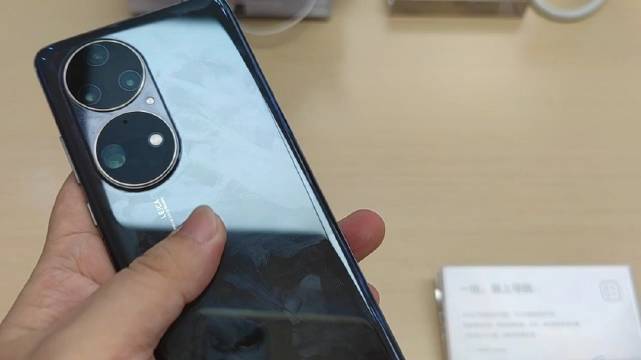 华为手机背面的小圆圈图标