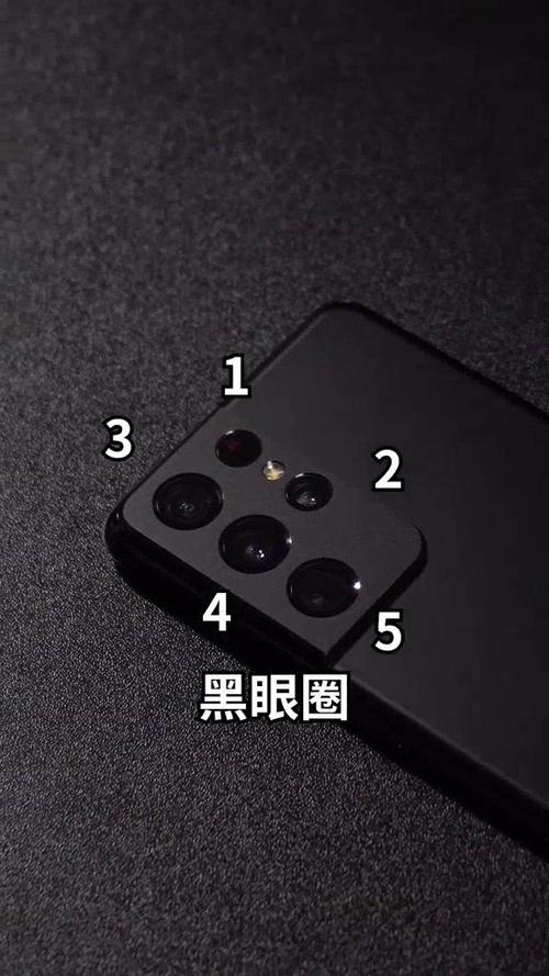 手机顶部有个黑圆圈图标