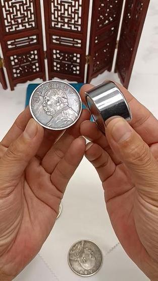 银元磁铁不吸是不是真的图标