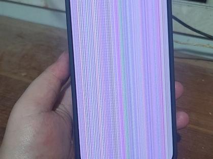 手机屏幕花屏是什么原因截图