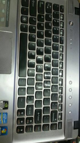 联想电脑按字母出现数字怎么办