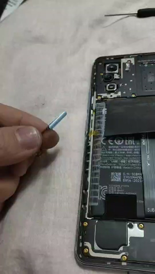 手机电源键碰一下就锁屏截图