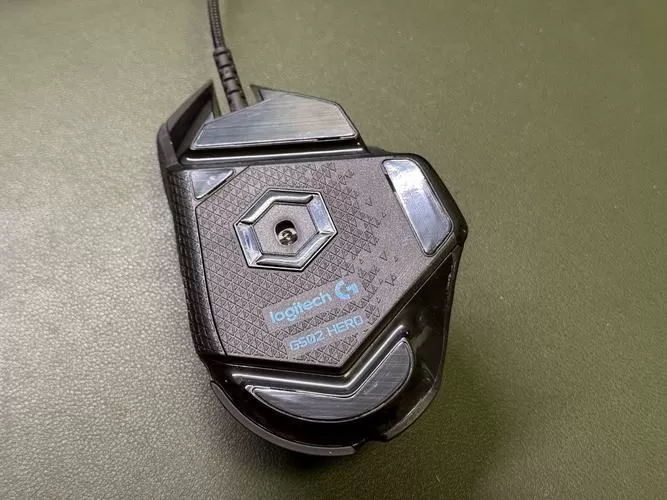 g502中间的滚轮老是自动滚