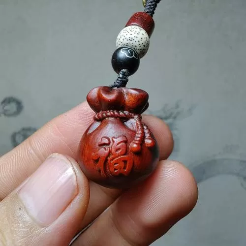 古代木头手把件钱袋截图